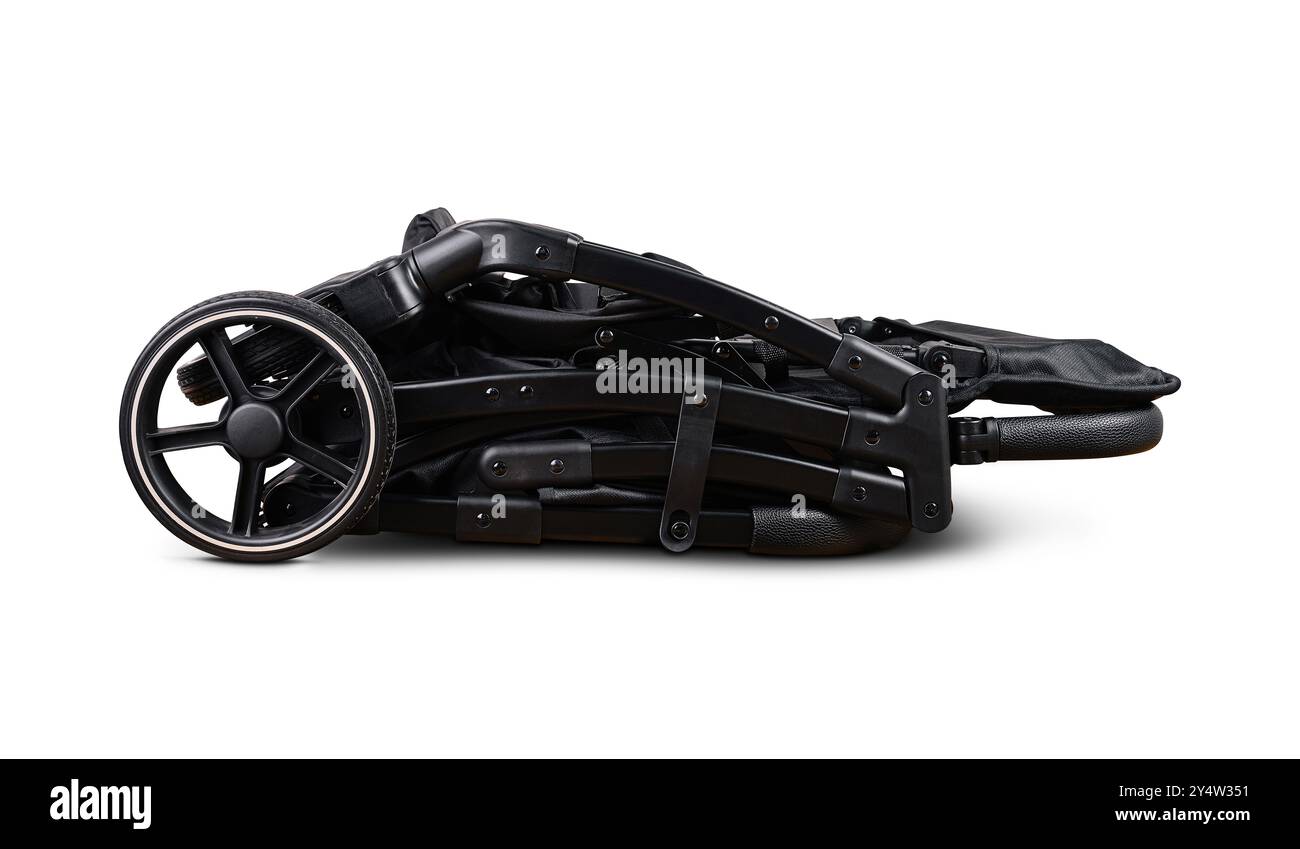 Modern black baby carriage with white rubber wheels folded compactly ...