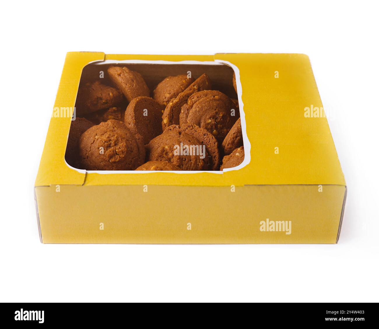 Delicious chocolate chip cookies are packed in a yellow cardboard box ...