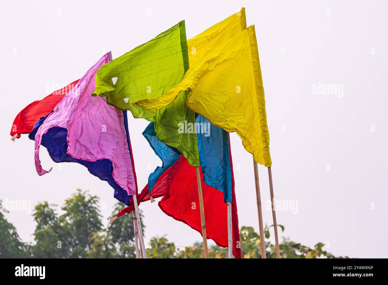 Banseli, Ajmer, Rajasthan, India. Colorful flag banners flapping in the ...