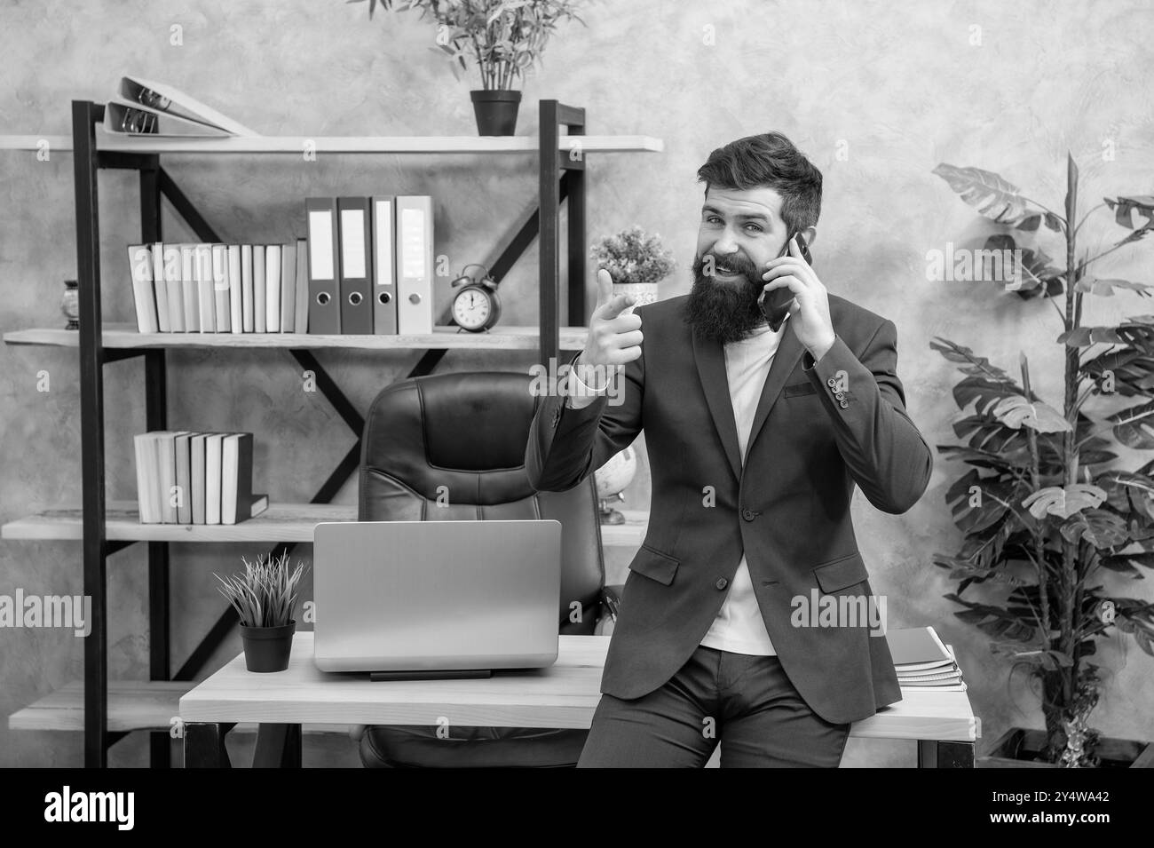 Advert happy man pointing Black and White Stock Photos & Images - Alamy