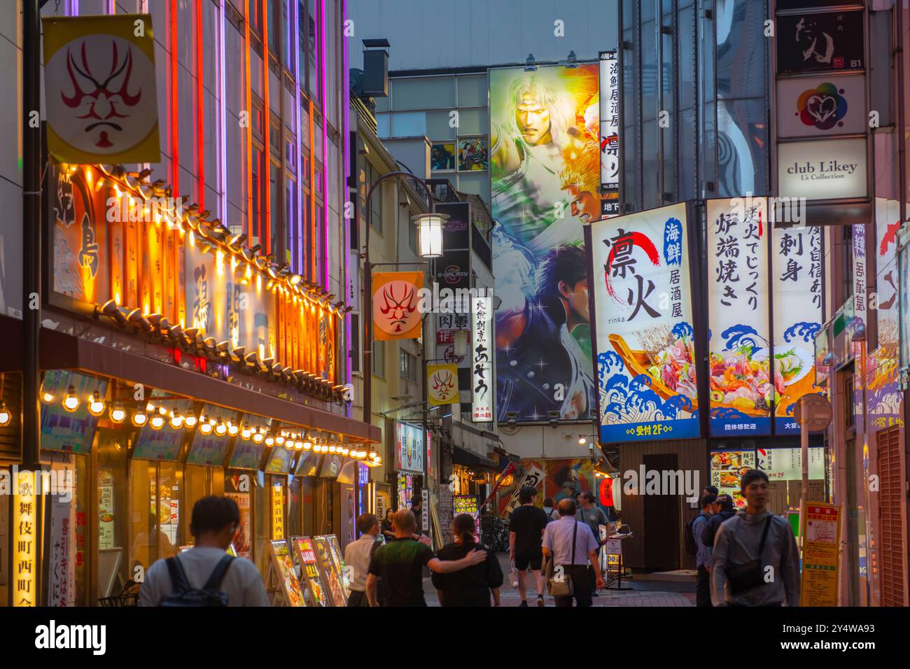 Shops and restaurants at night on Kabukicho Ichiban Gai Street in ...
