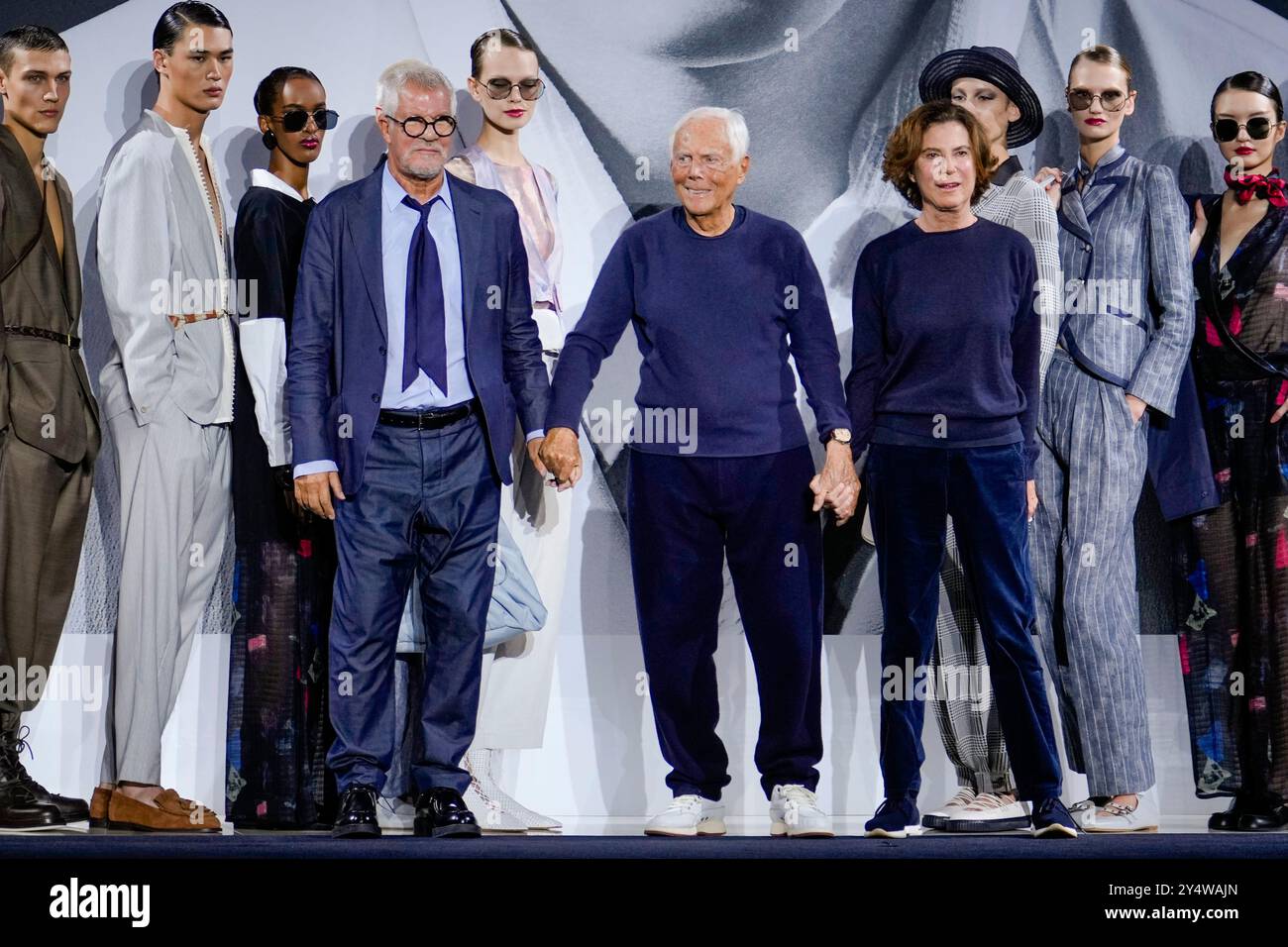 Italian fashion designer Giorgio Armani, center, with Pantaleo Dell ...