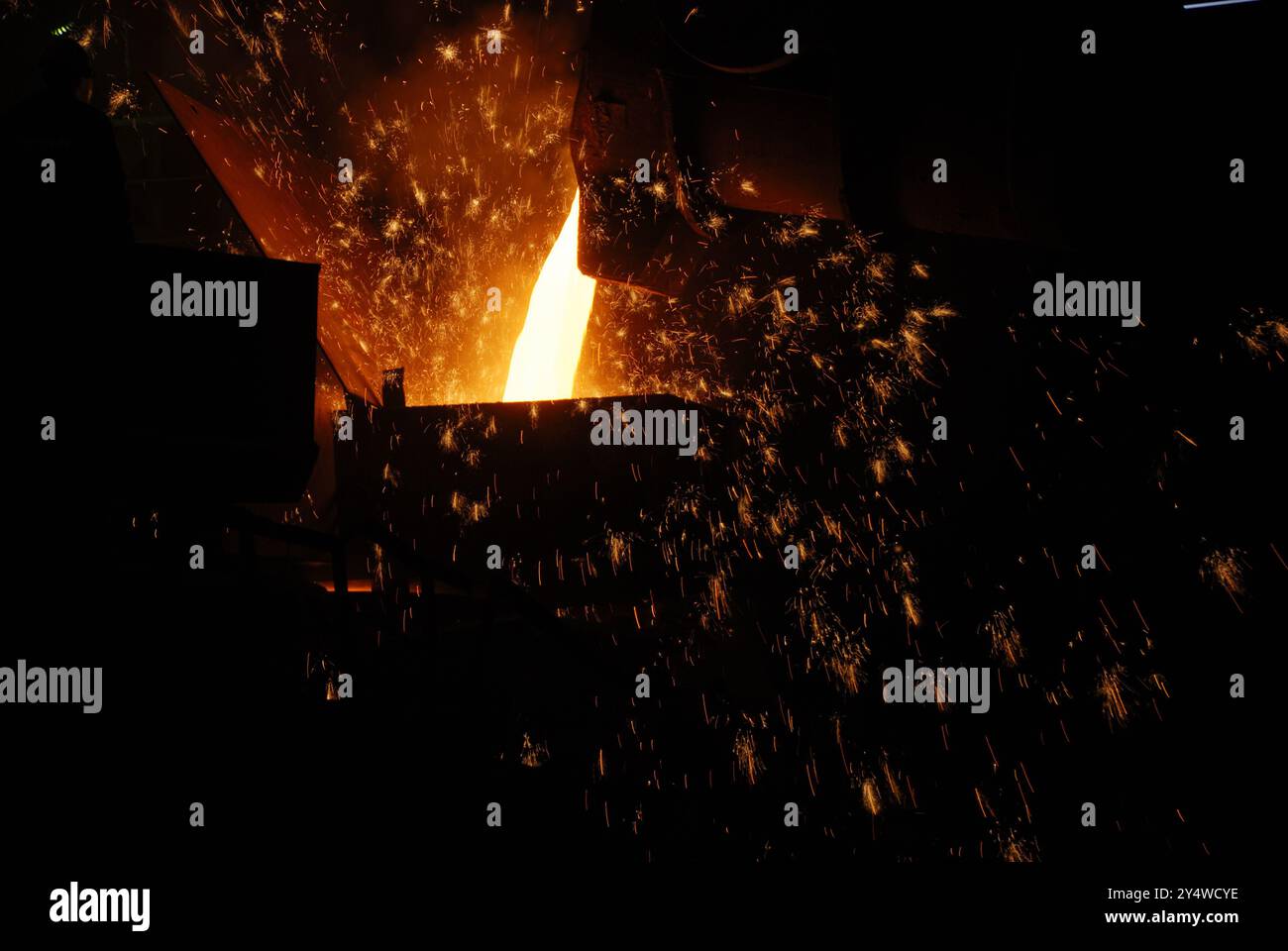 Glowing molten metal pouring from hi-res stock photography and images ...