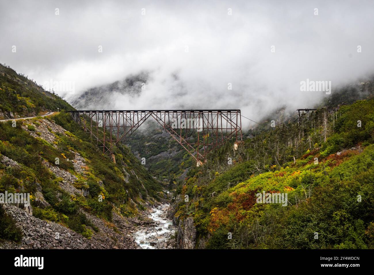 Collapsed bridge seen from the White Pass-Yukon Route railroad in ...