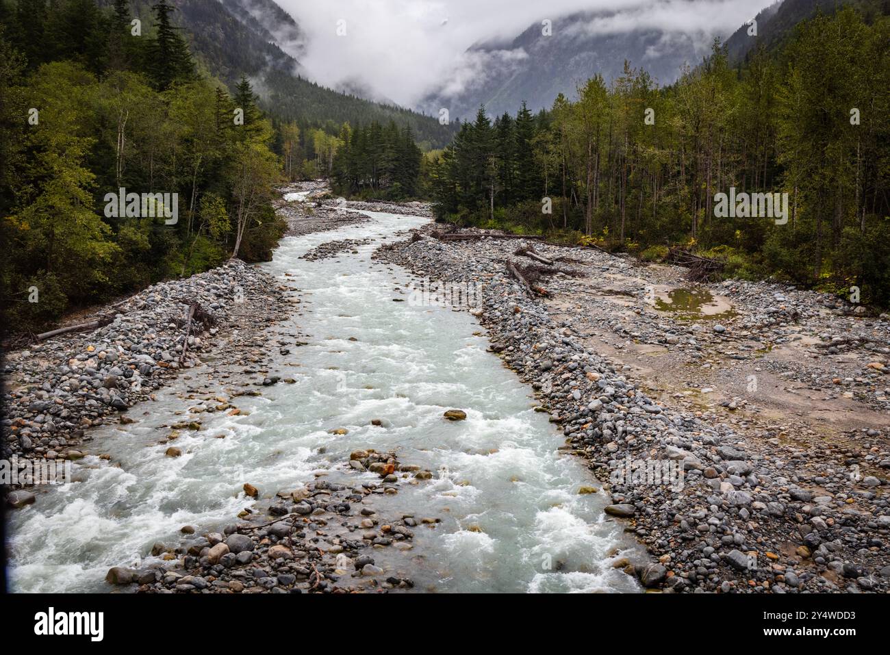 River with glacier water seen from the White Pass-Yukon Route railroad ...