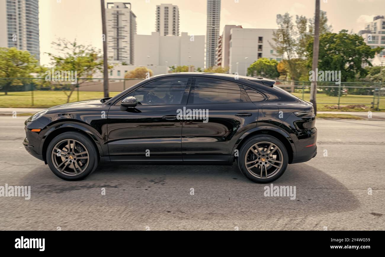 Miami Beach, Florida USA - April 15, 2021: black Porsche Cayenne, side ...