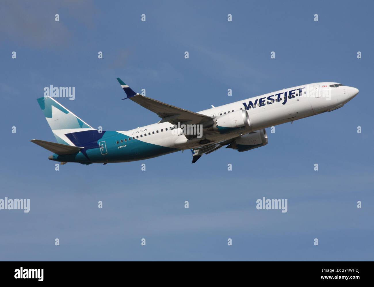 A Boeing 737 MAX 8 of Westjet departing London Gatwick Airport Stock ...