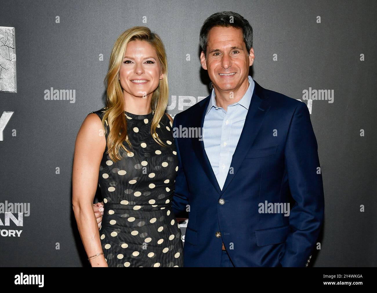 Kate Bolduan, left, and John Berman attend the premiere of "Super/Man ...