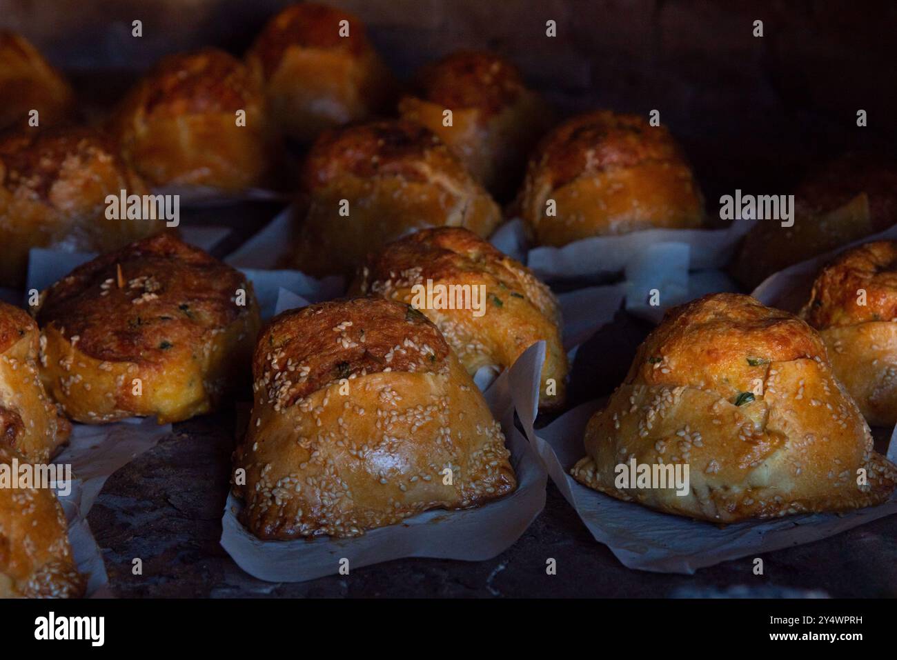 Traditional delicious cypriot easter cheese pastries in the clay oven ...