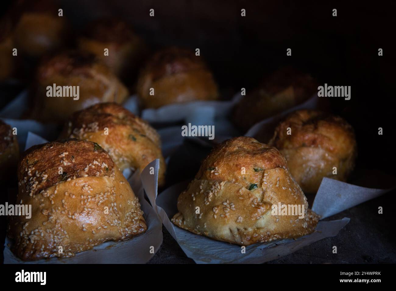 Traditional delicious cypriot easter cheese pastries in the clay oven ...