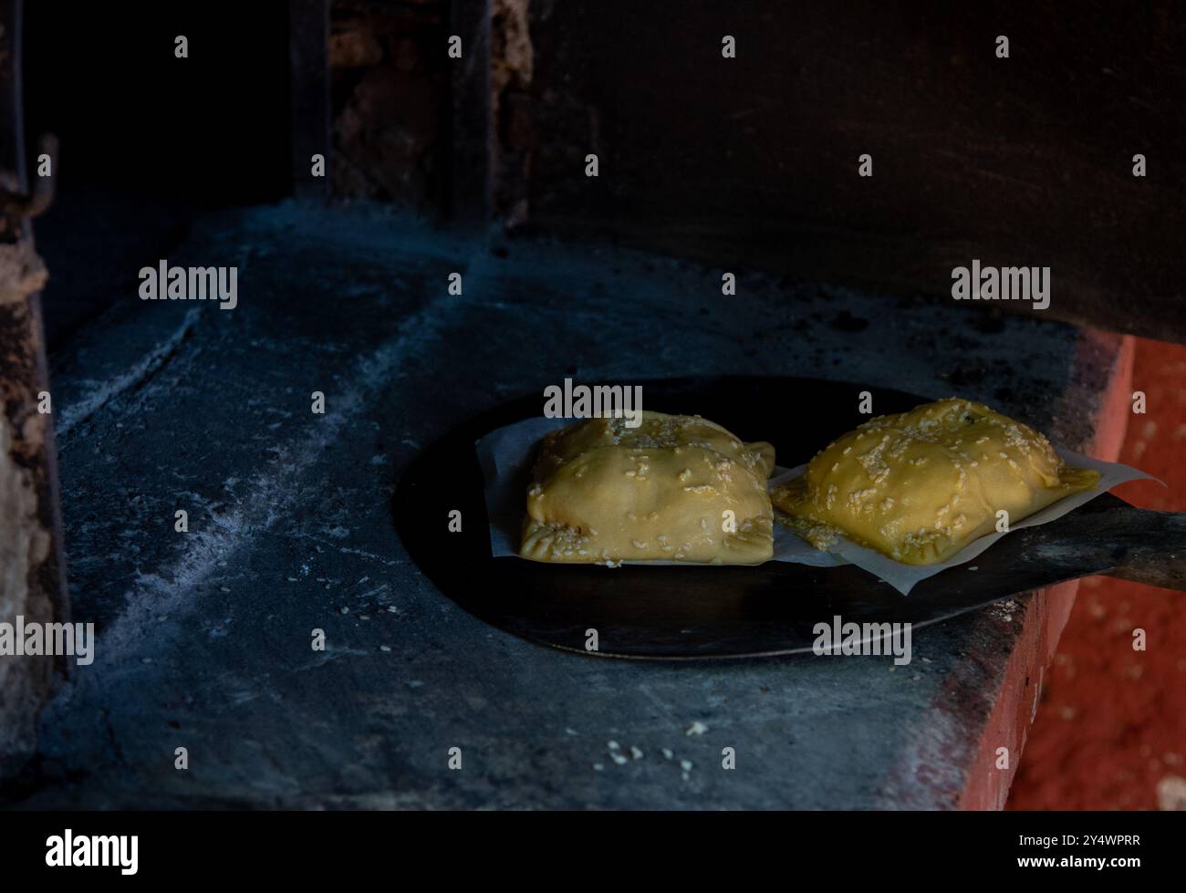 Traditional delicious cypriot easter cheese pastries in the clay oven ...