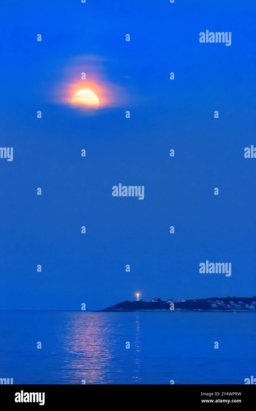 Harvest Super Moon Breaking Through the Clouds Next to Bakers Island ...