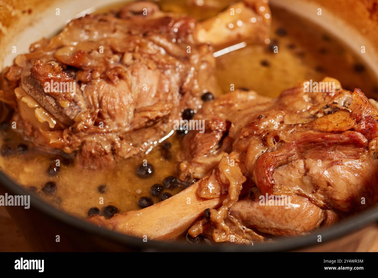Two braising pork shanks. Braised pork shank is a German classic dish ...