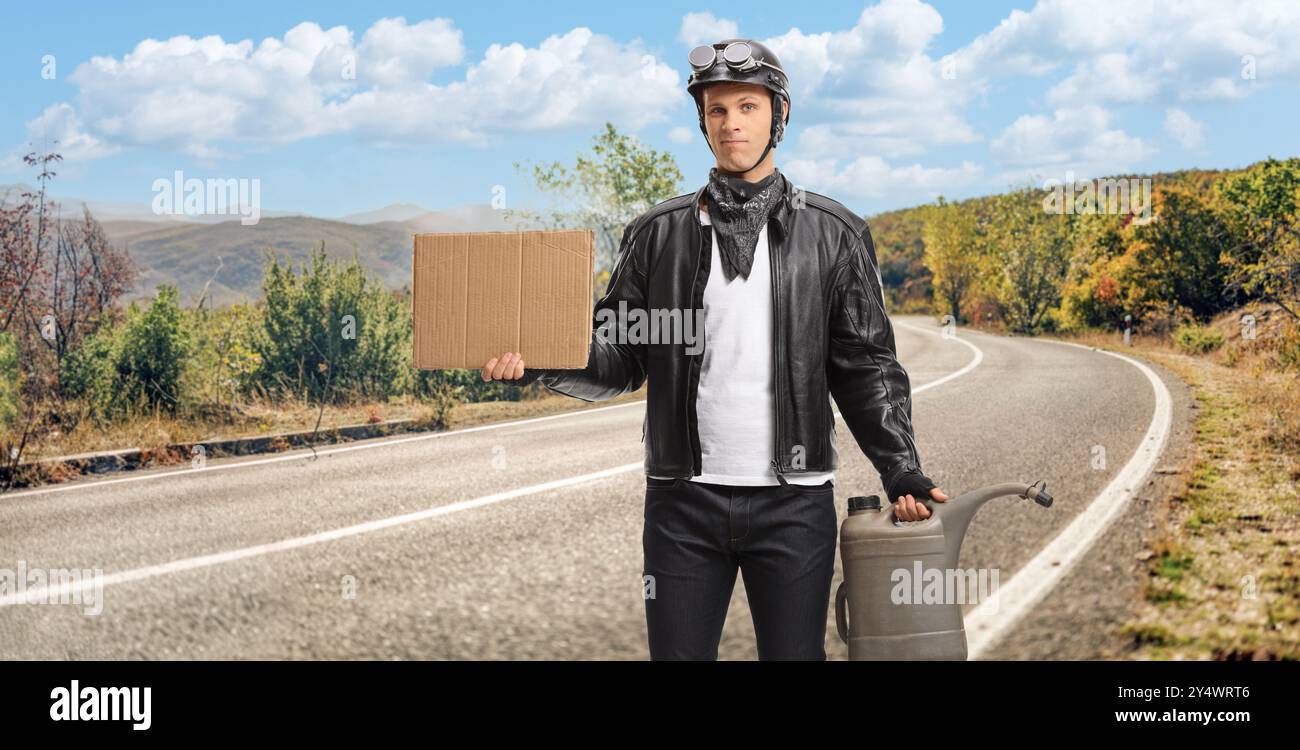 Biker holding holding a blank sign hi-res stock photography and images ...