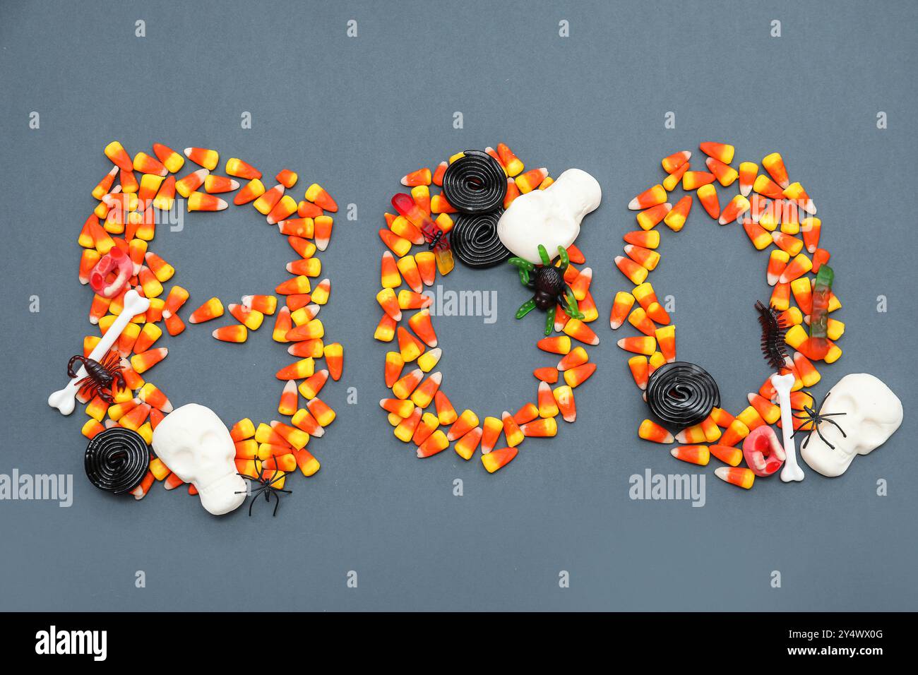 Word BOO made of different candies and decorations for Halloween on ...