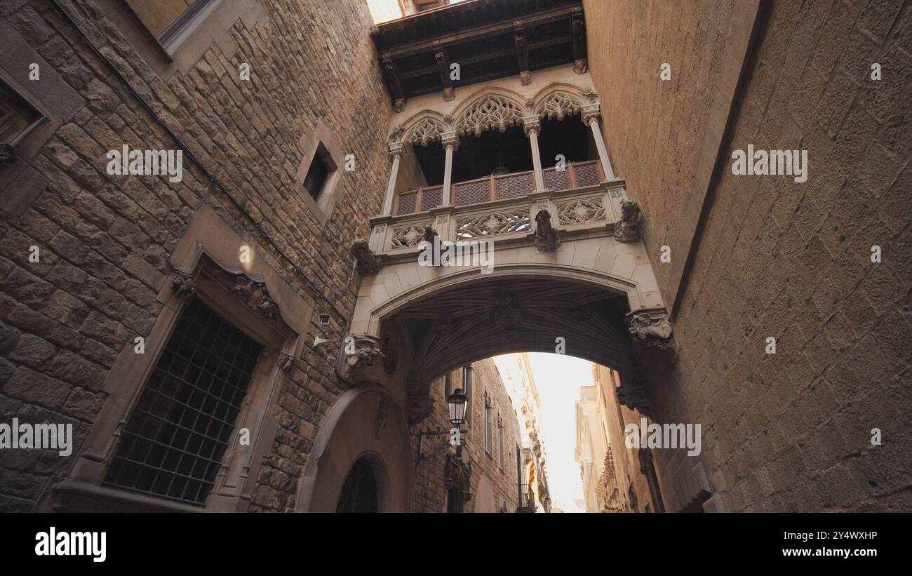 A historical Gothic bridge between buildings in Barri Gotic Quarter ...