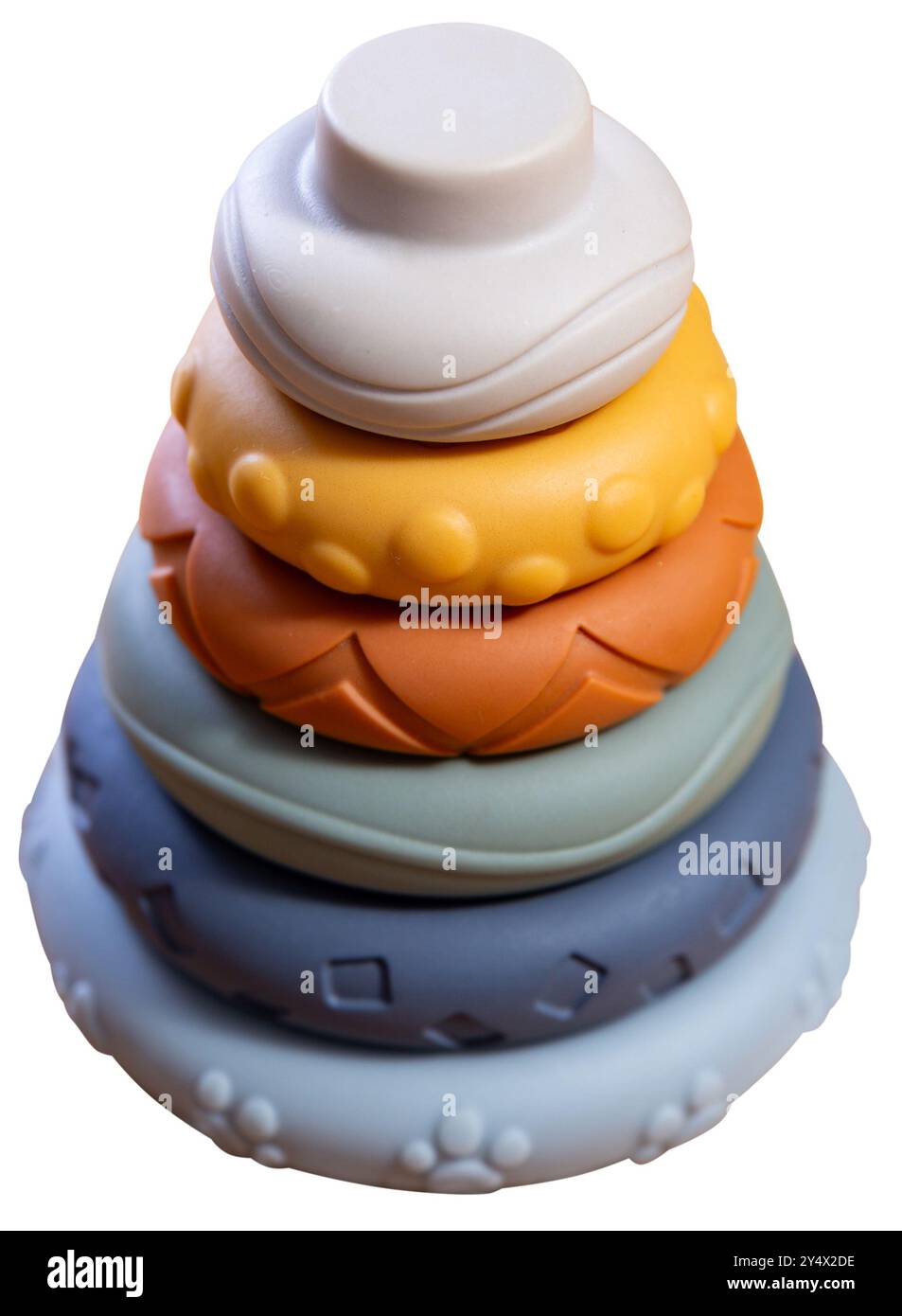 Childrens pyramid made of round ring elements stands Stock Photo - Alamy