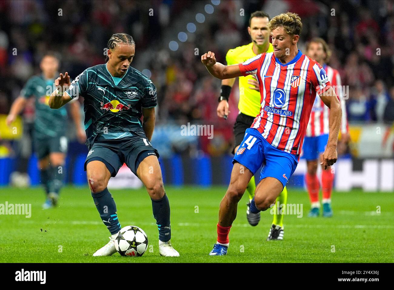 Xavi Simons of RB Leipzig and Marcos Llorente of Atletico de Madrid ...