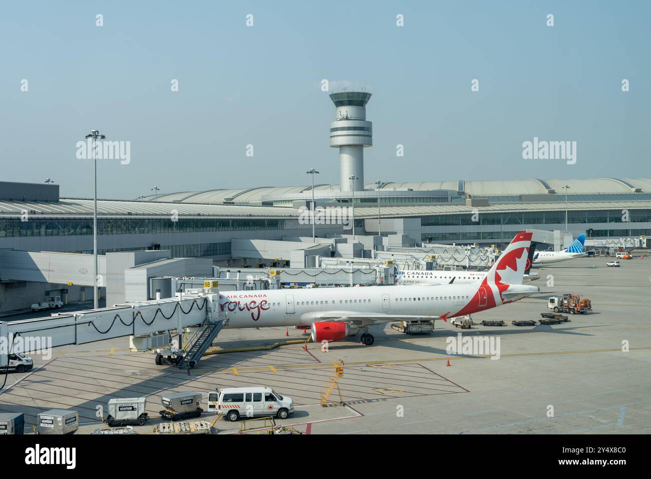 An Air Canada rouge plane parked at Toronto’s Pearson International ...