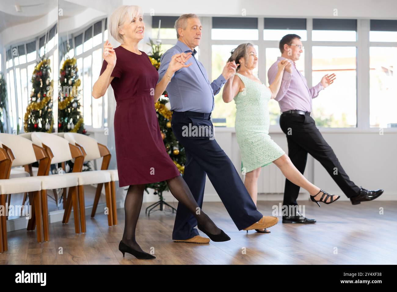 Group of men and women dancing folk dance Stock Photo - Alamy