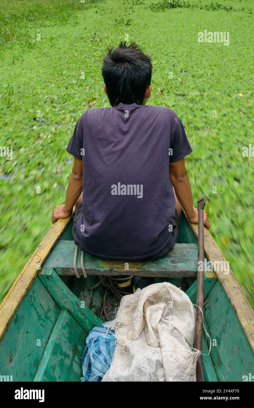 Traditional wooden boat navigating on Amazon River, Peru Stock Photo ... Traditional wooden boat navigating on Amazon River, Peru Stock Photo ...