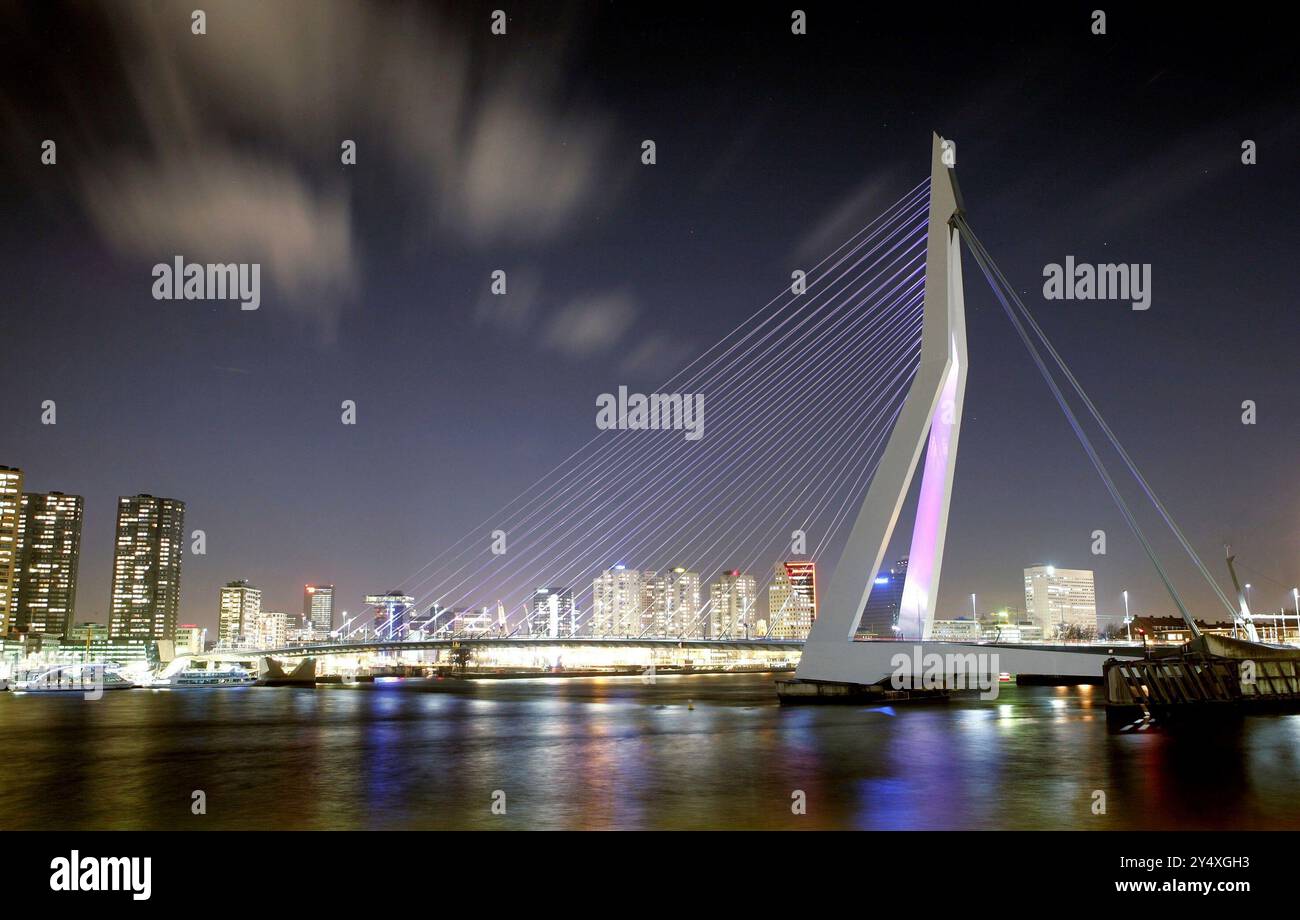 FILE - The Erasmus Bridge towers over the river Maas in Rotterdam, the ...