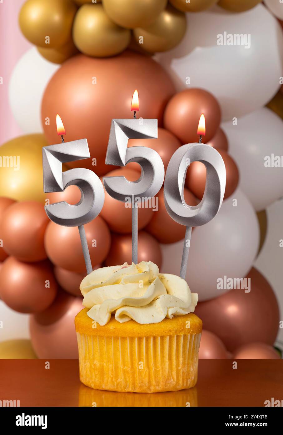 Birthday candle number 550 - Celebration balloons background Stock ...