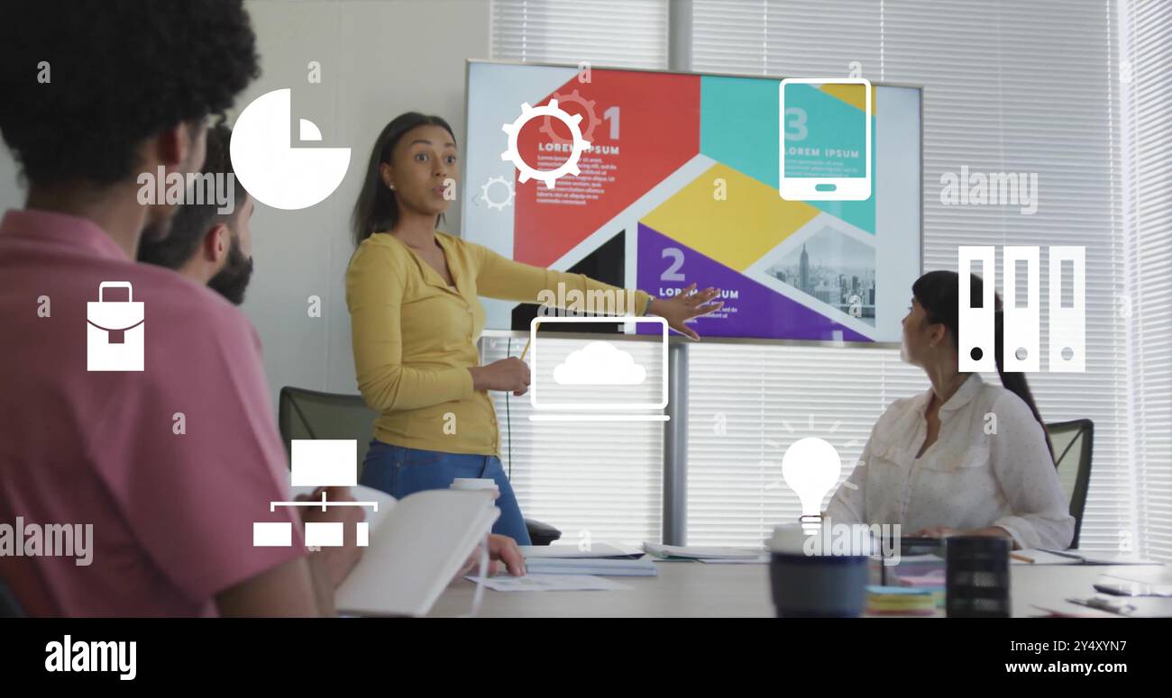 Image of communication media icons over diverse colleagues at ...