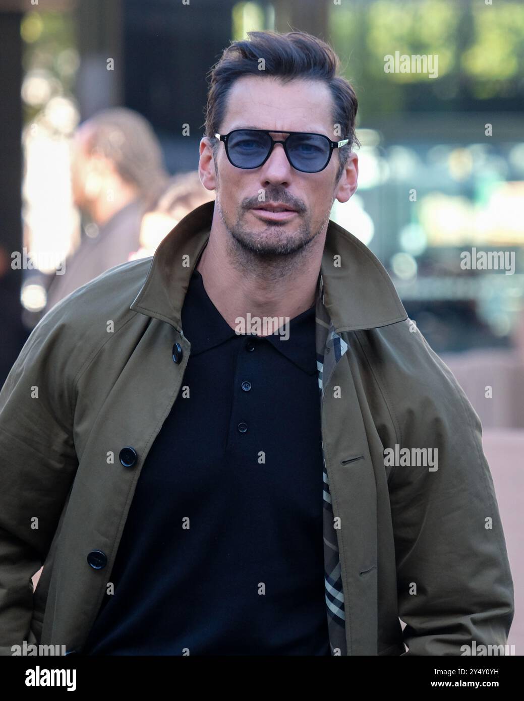 Model David Gandy poses for photos as he arrives for the Burberry SS25 ...