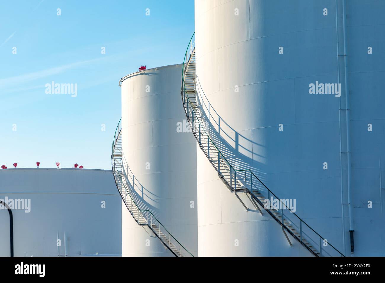 huge white silos in a silo farm with petrol Stock Photo - Alamy