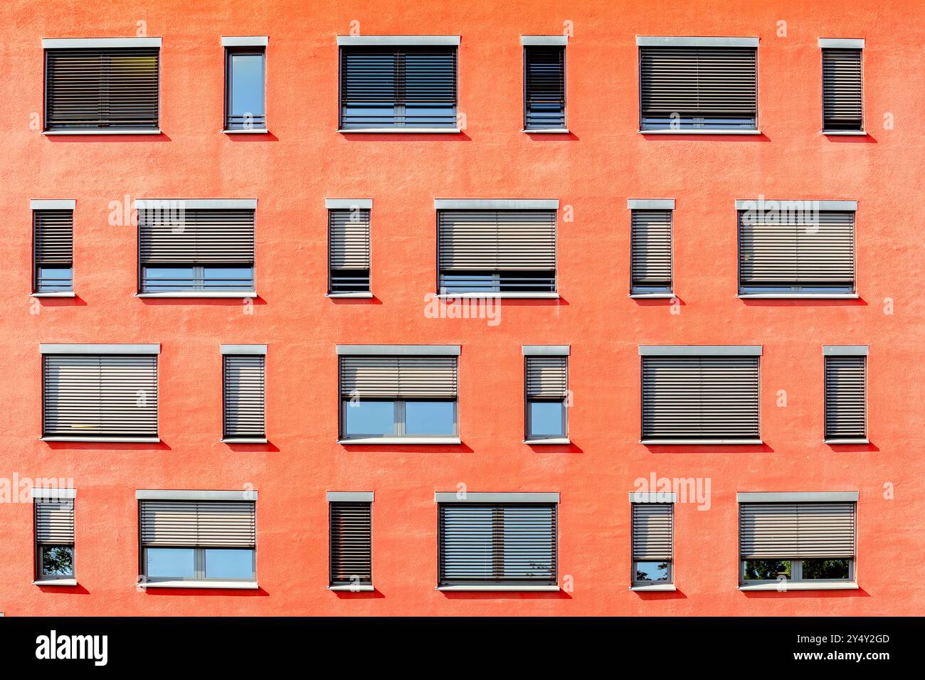 detail of facade of red painted office wall as business backgrpound ...