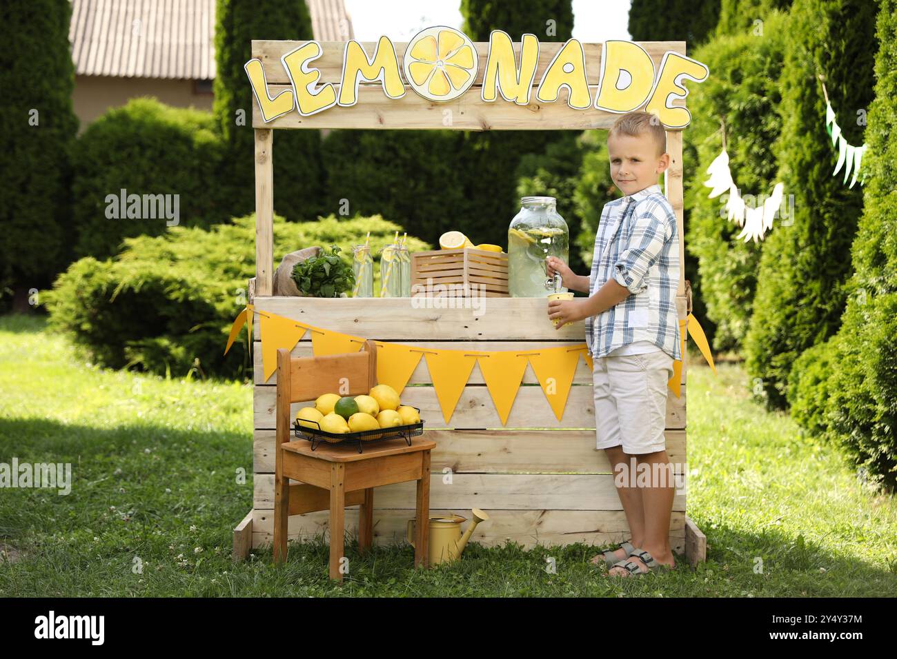 Cute boy pouring refreshing hi-res stock photography and images - Alamy
