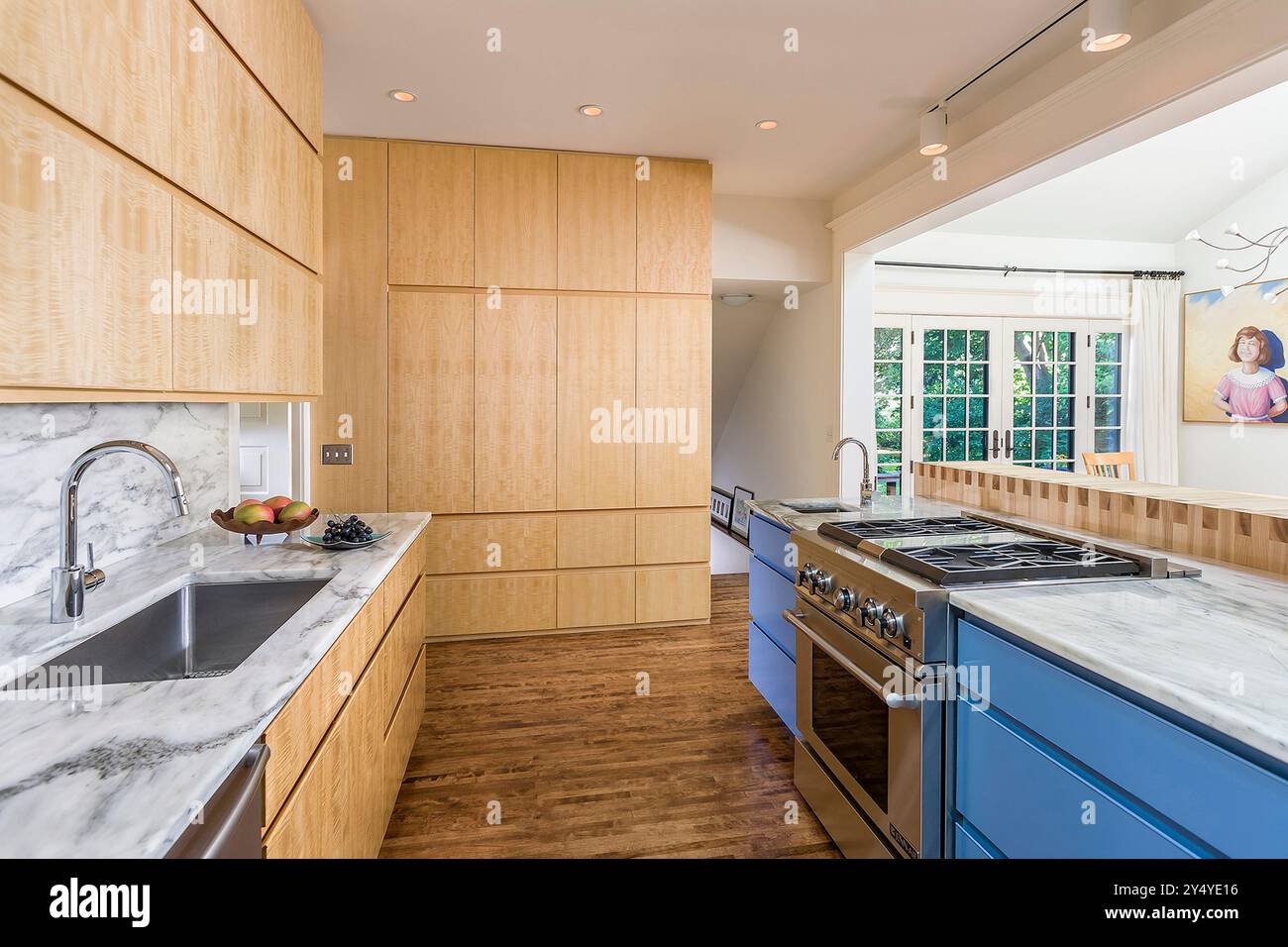 Remodeled kitchen with both Japanese ash and blue painted cabinets ...