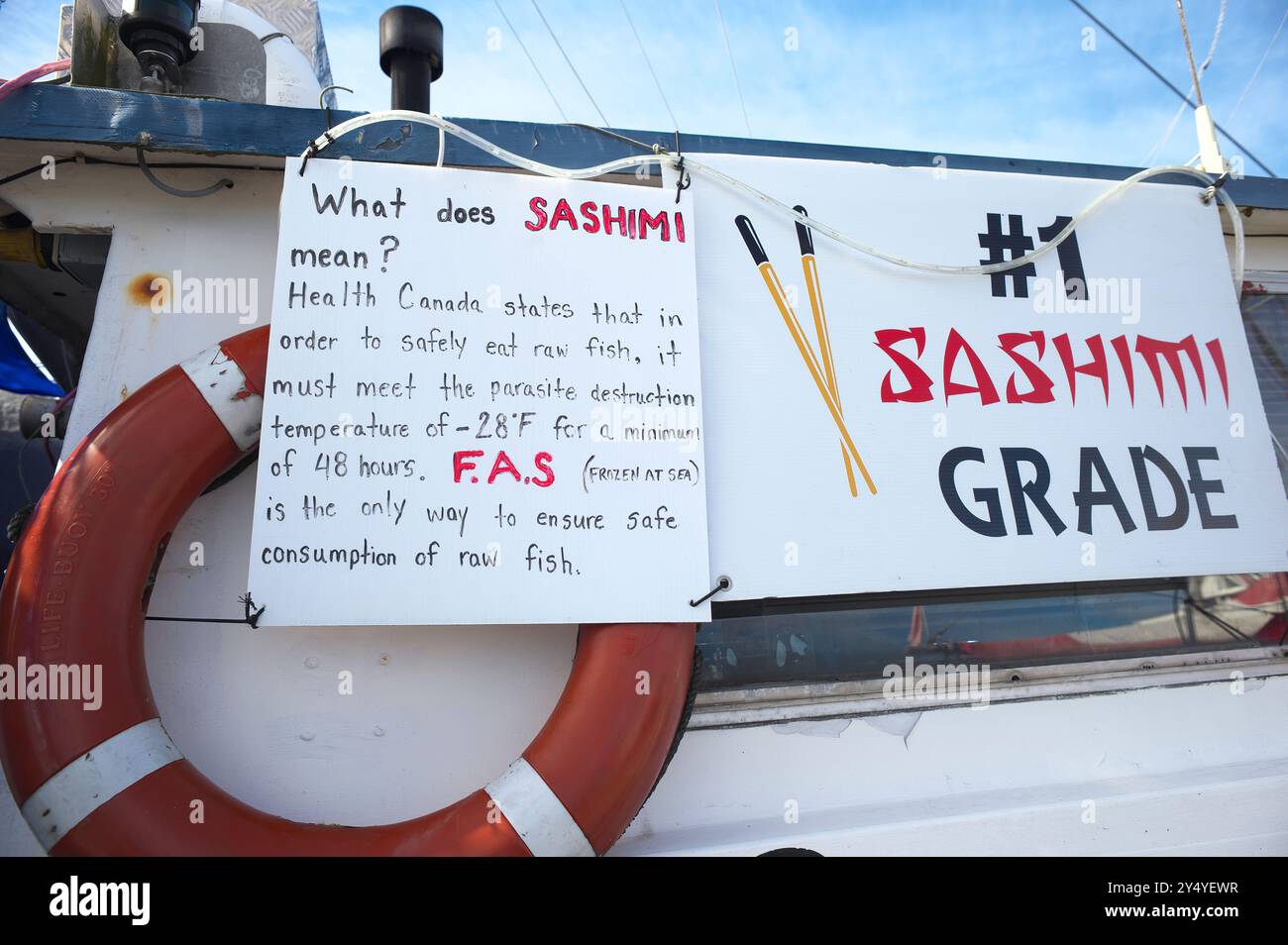 Sashimi grade- a sign displayed on a fishing trawler docked at ...