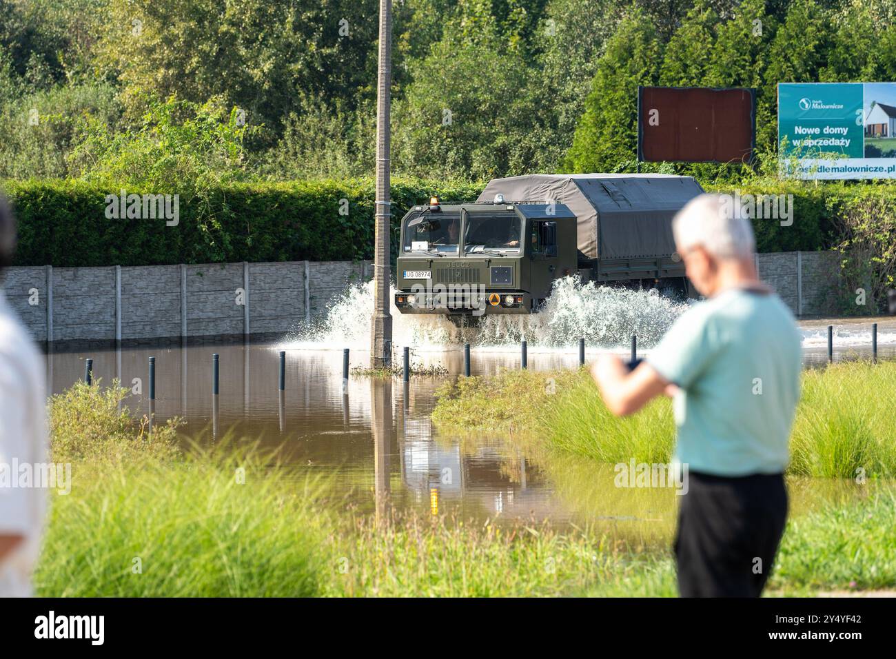 A military truck drives out of the flooded street. Wroclaw is preparing ...