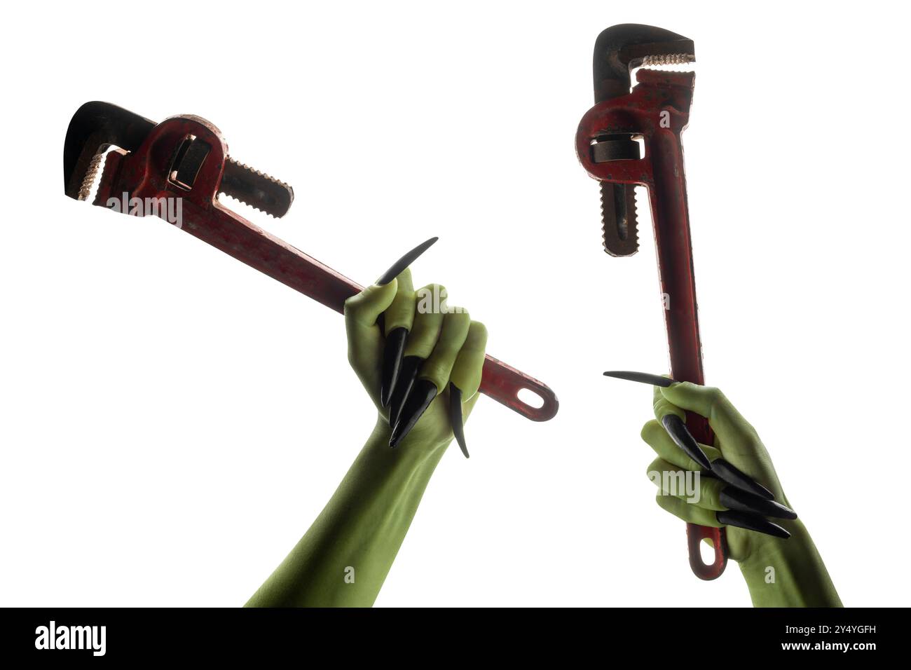 Set of witches hands holding red pipe wrench. The hand color is green ...