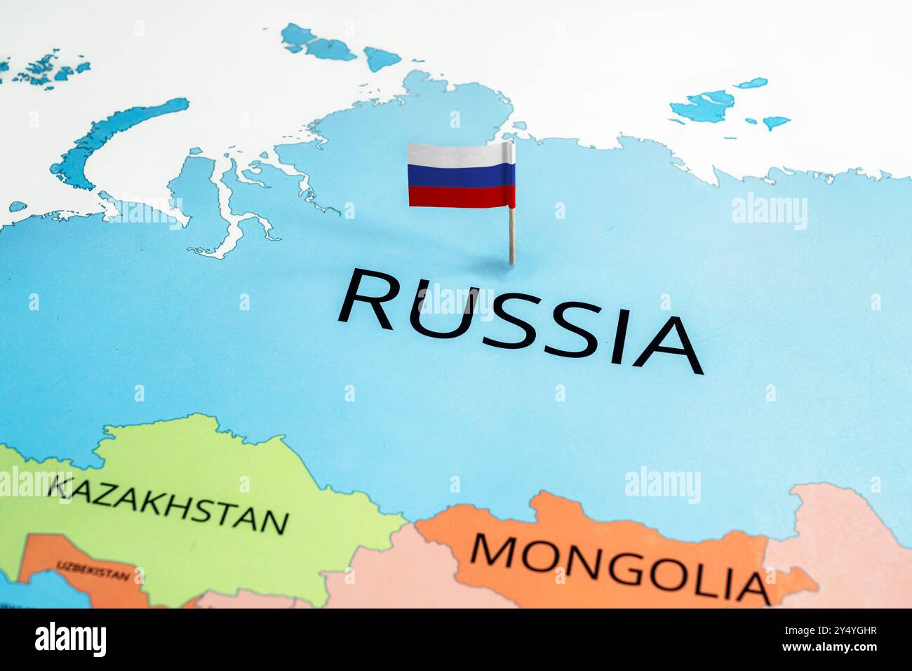 A map of Russia with the Russian flag on it. The flag colors are white ...