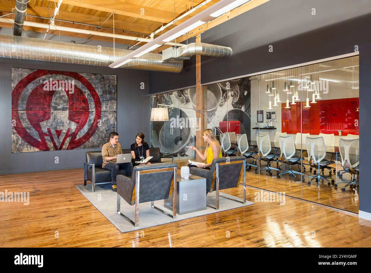 Three people talking hi-res stock photography and images - Alamy