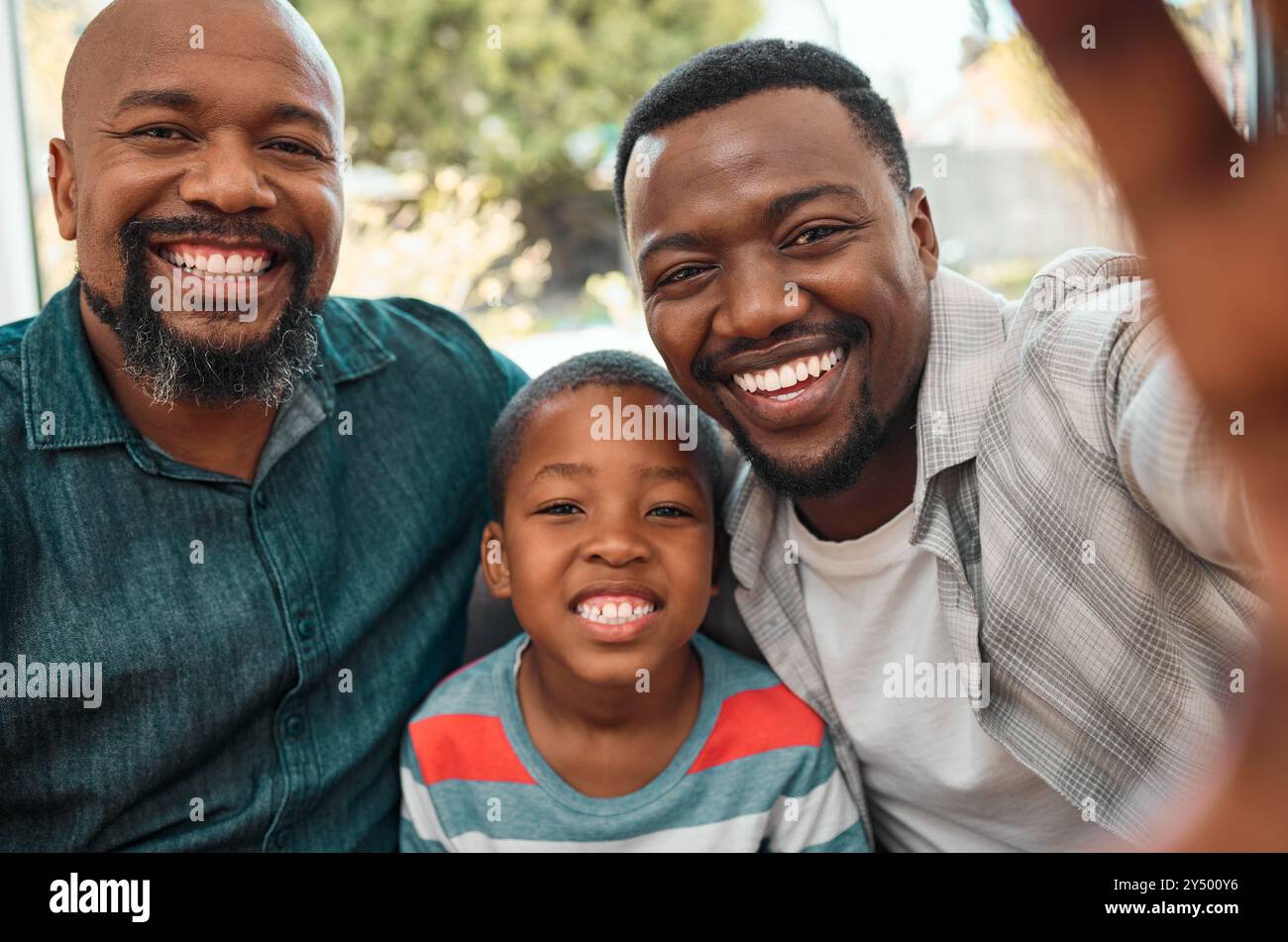 Black family, portrait and selfie in home, love and hug child for ...