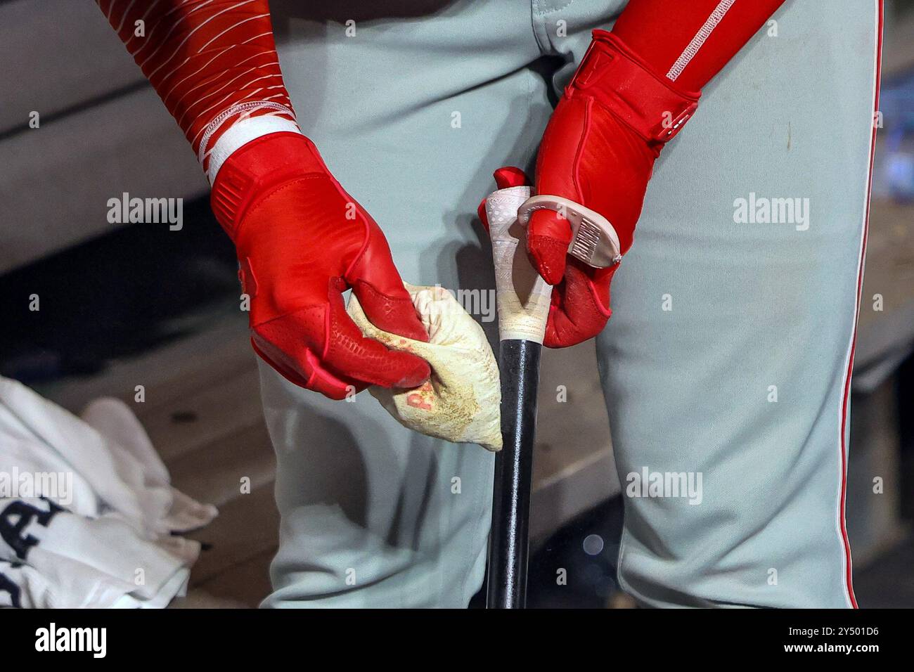 Philadelphia Phillies Bryce Harper #3 prepares bat in dugout during the ...