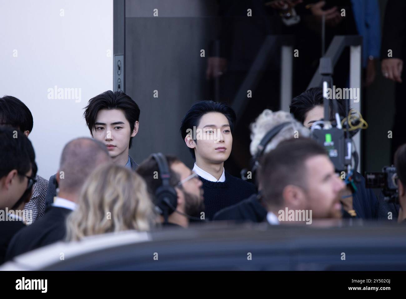 Park Sung-hoon and Sunoo from Enhypen arrive at the Prada fashion show ...