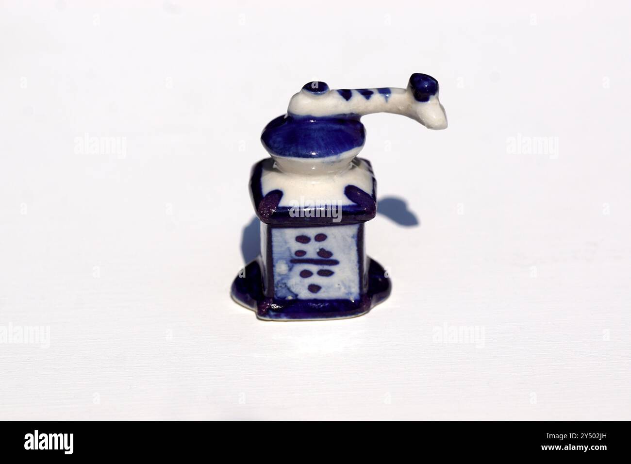 Coffee mill as Delft blue ceramic souvenir from Holland. Isolated on ...