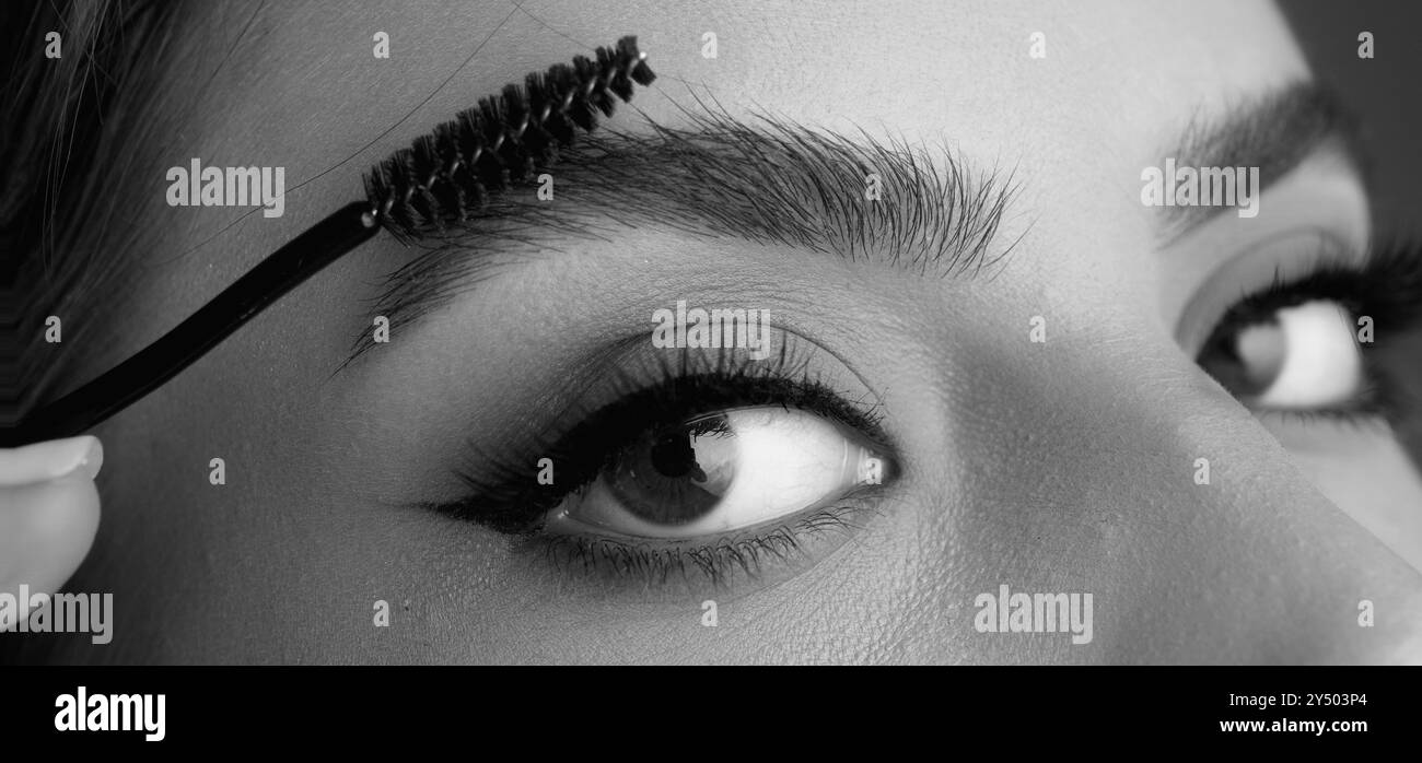 Close up eyebrows with eyebrow brush. Care for brows, eyebrows ...
