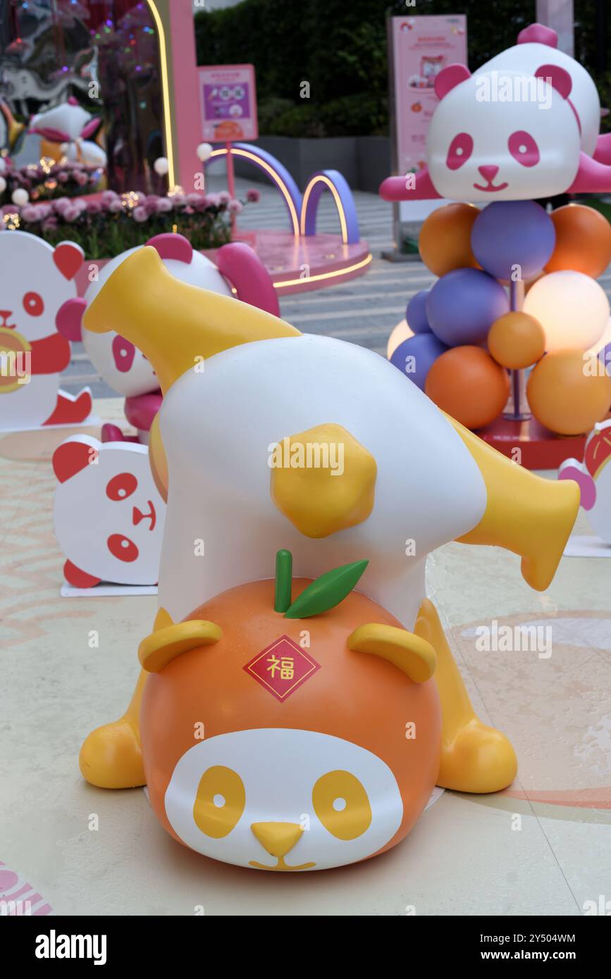 Display model panda on hand stand Stock Photo - Alamy