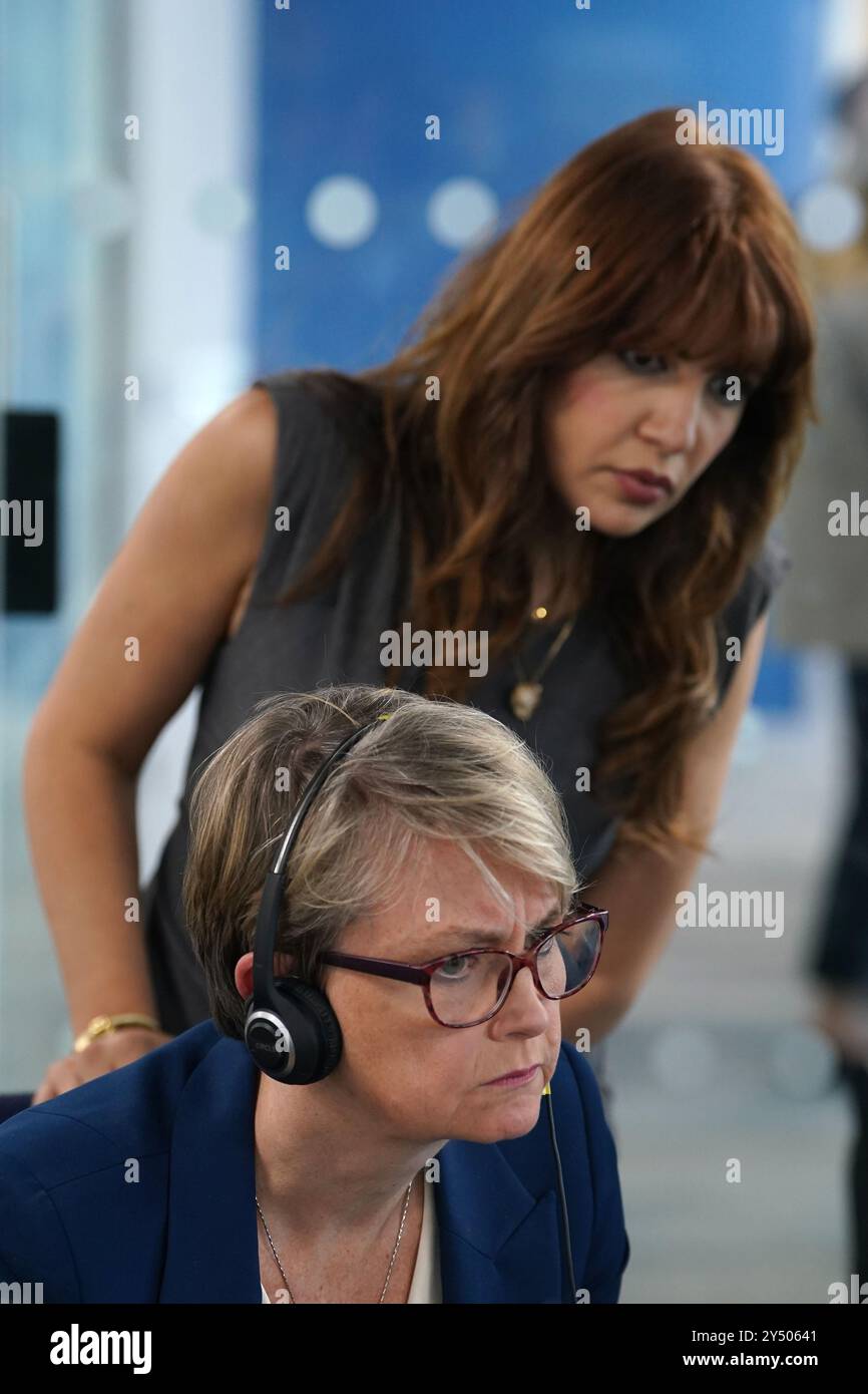 Home Secretary Yvette Cooper, with counsellor and campaigner Nour ...