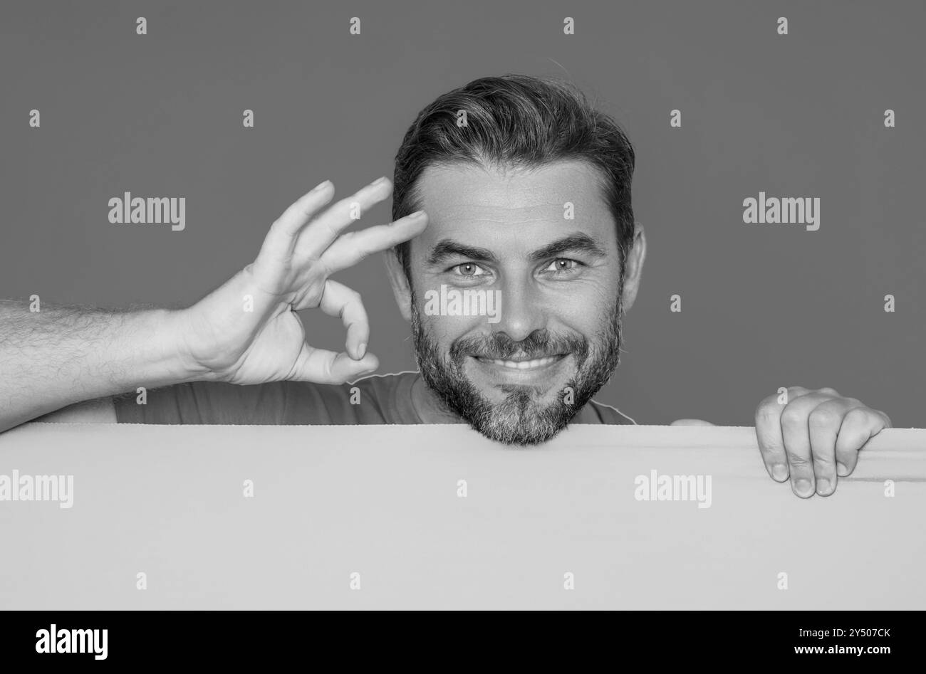 Man holds the sign, blank card. Placard ready for your product. Sign to ...