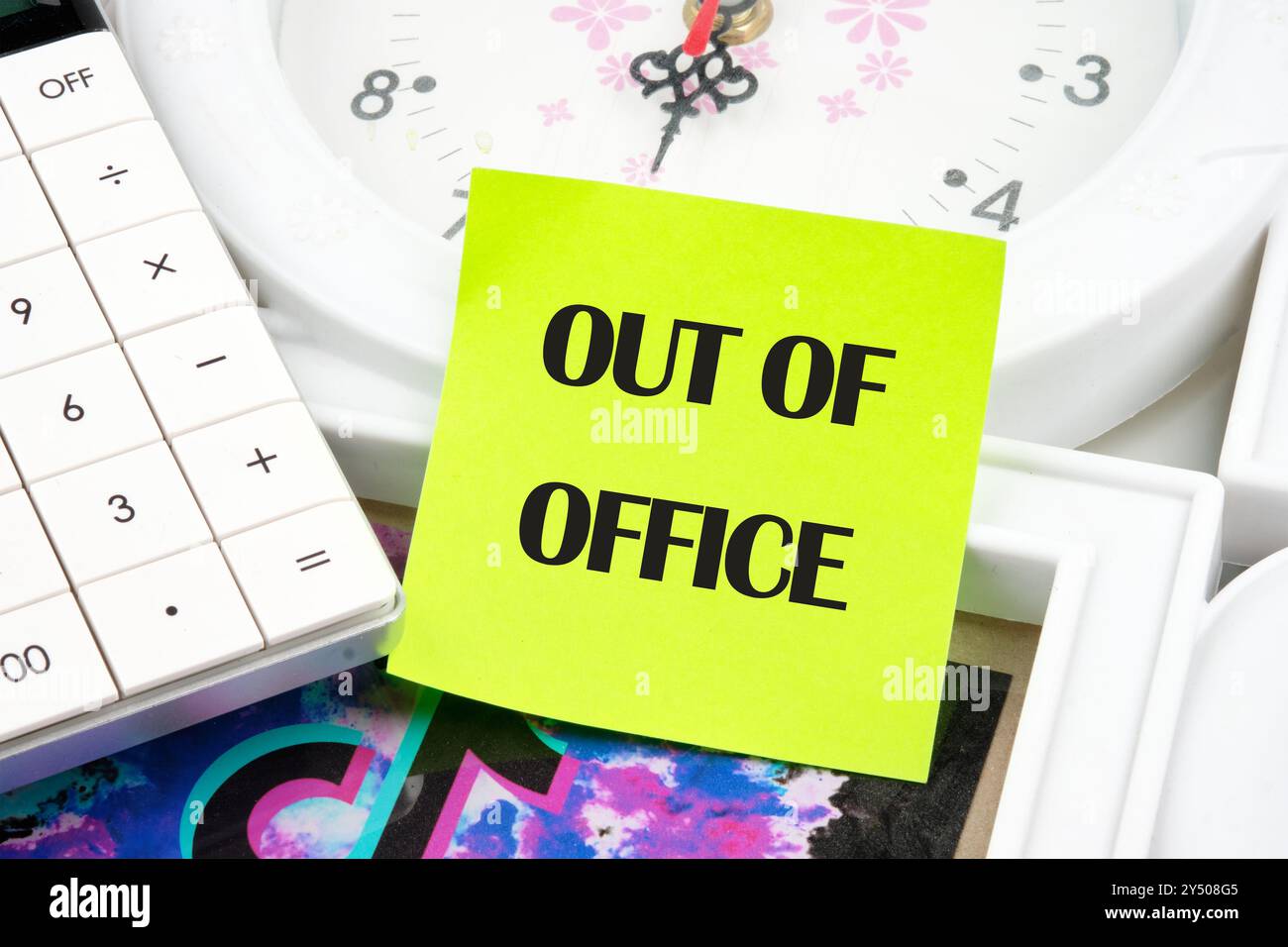 OUT OF OFFICE words written on the sticker, front view Stock Photo - Alamy