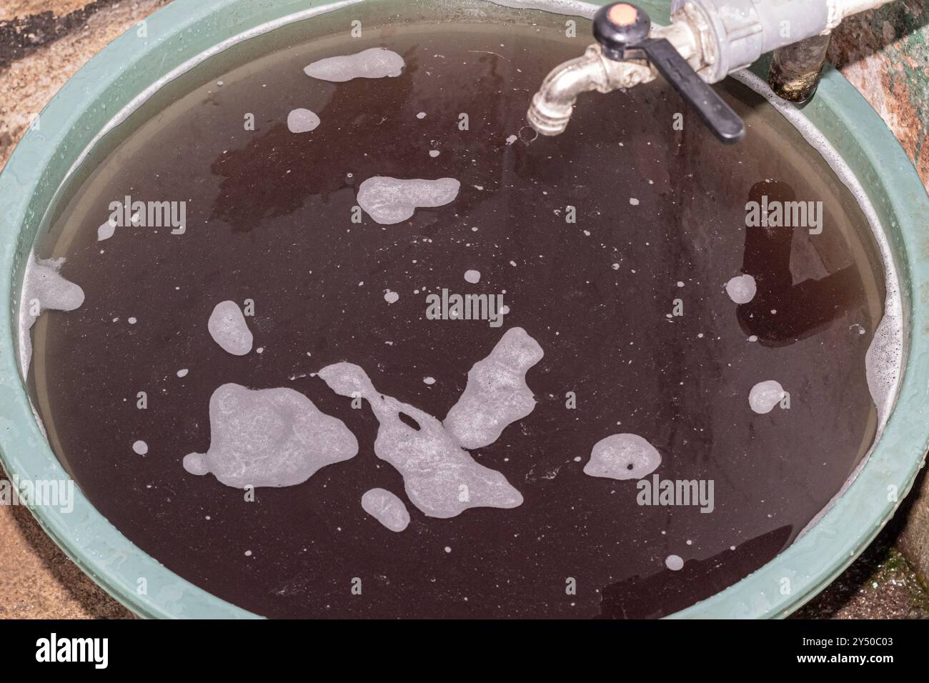 Texture of frothy water used in laundry Stock Photo - Alamy