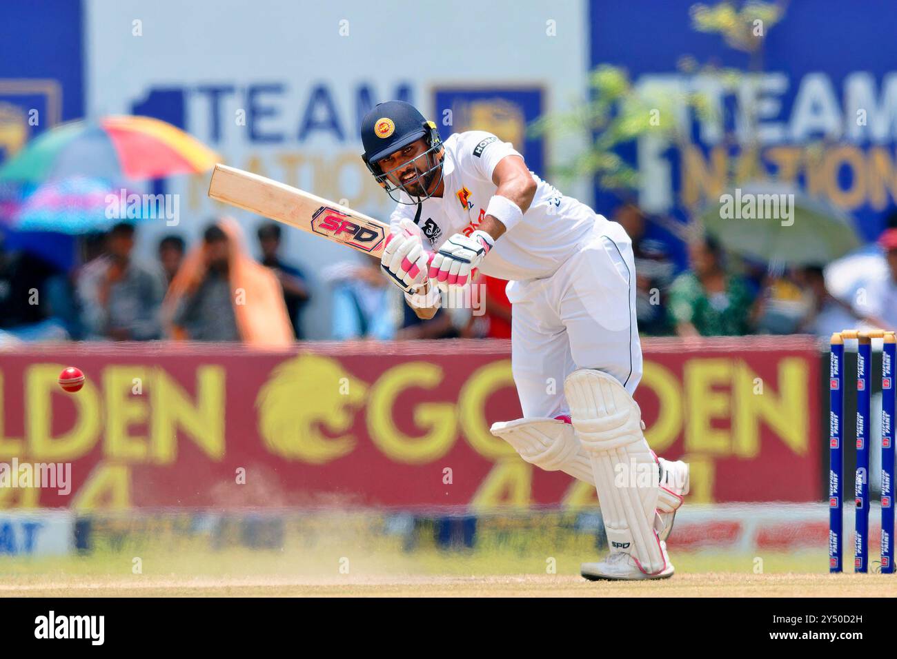 Sri Lanka's Dinesh Chandimal plays a shot on the third day of the first ...