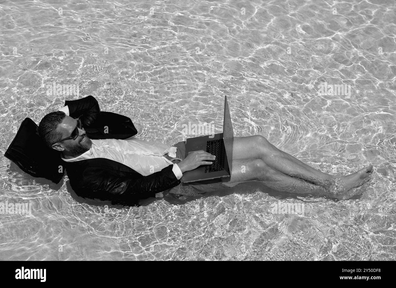 Business man trip relaxing Black and White Stock Photos & Images - Alamy